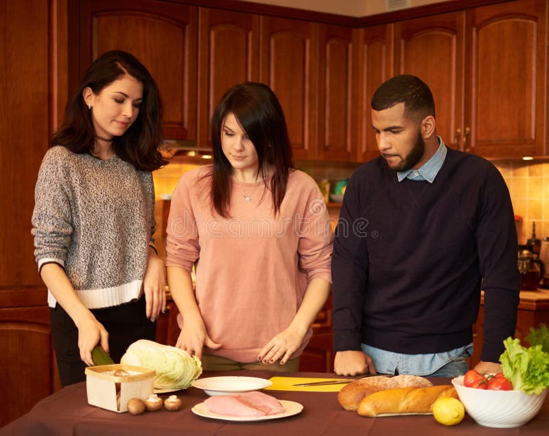 Group of Multi Ethnic Young Friends in Kitchen Prepare for Party Stock ...