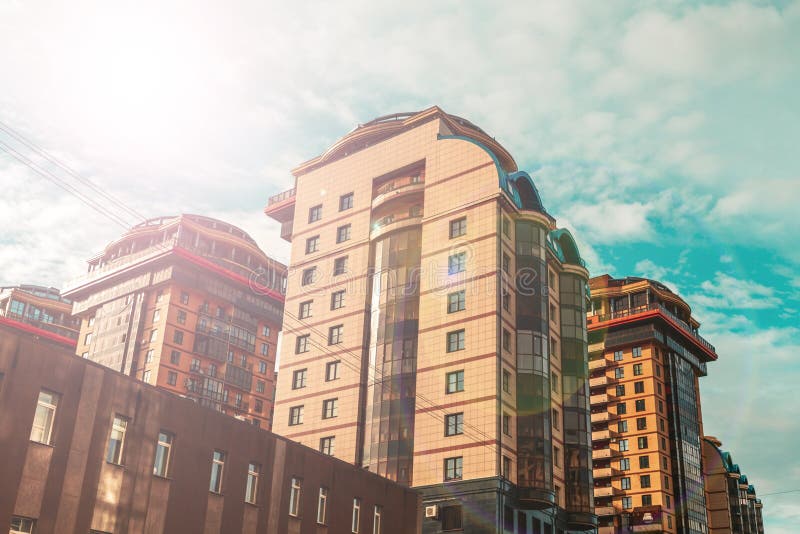 Group of Multi-storey Residential Buildings in Bright Light Stock Photo ...