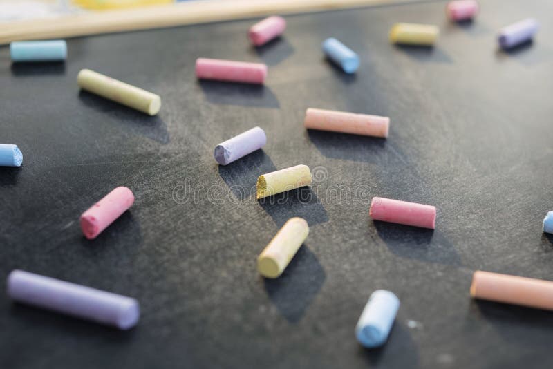 Group of Multicolored Chalks on Black Chalkboard Stock Image - Image of ...