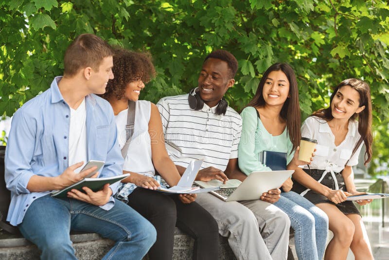 Group of Multicultural University Students Posing Outdoors after Study ...