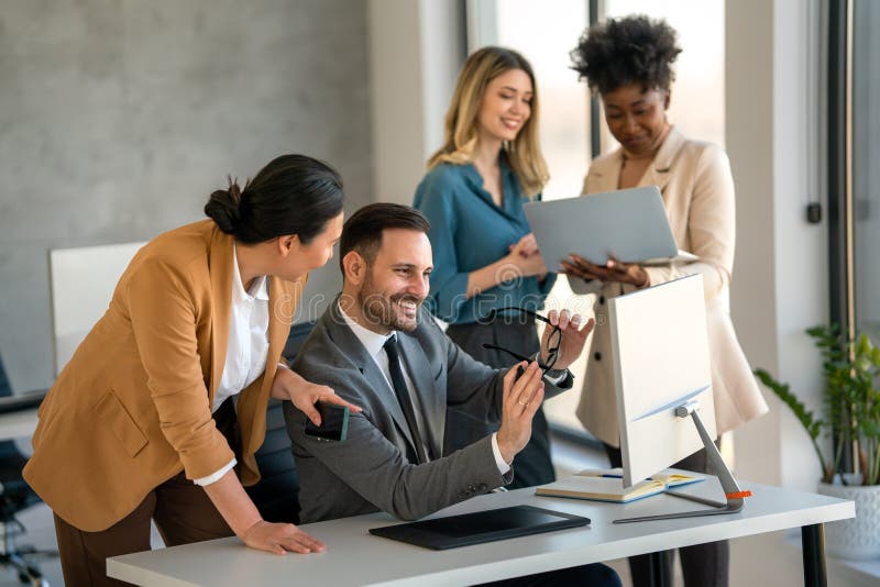 Group of Multiethnic Business People Analyzing Data Using Computer ... Group of Multiethnic Business People Analyzing Data Using Computer ...