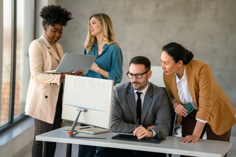 Group of Multiethnic Business People Analyzing Data Using Computer ... Group of Multiethnic Business People Analyzing Data Using Computer ...