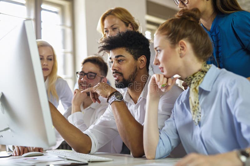 Group of Multiethnic Business People Cooperating during Business ... Group of Multiethnic Business People Cooperating during Business ...