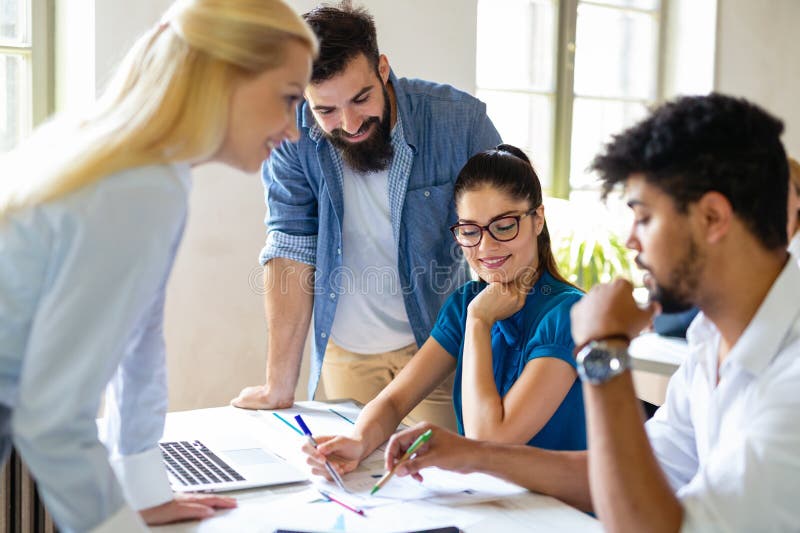 Group of Multiethnic Business People Cooperating during Business ...
