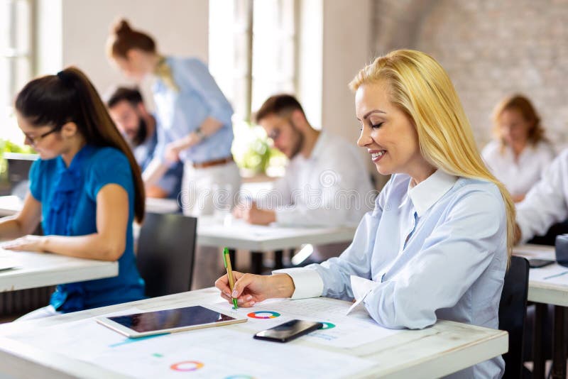 Group of Multiethnic Business People Cooperating during Business ...
