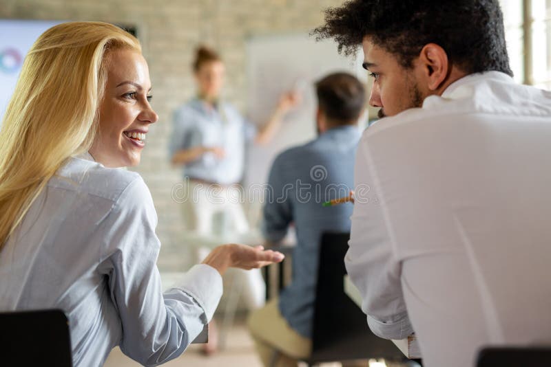Group of Multiethnic Business People Cooperating during Business ...