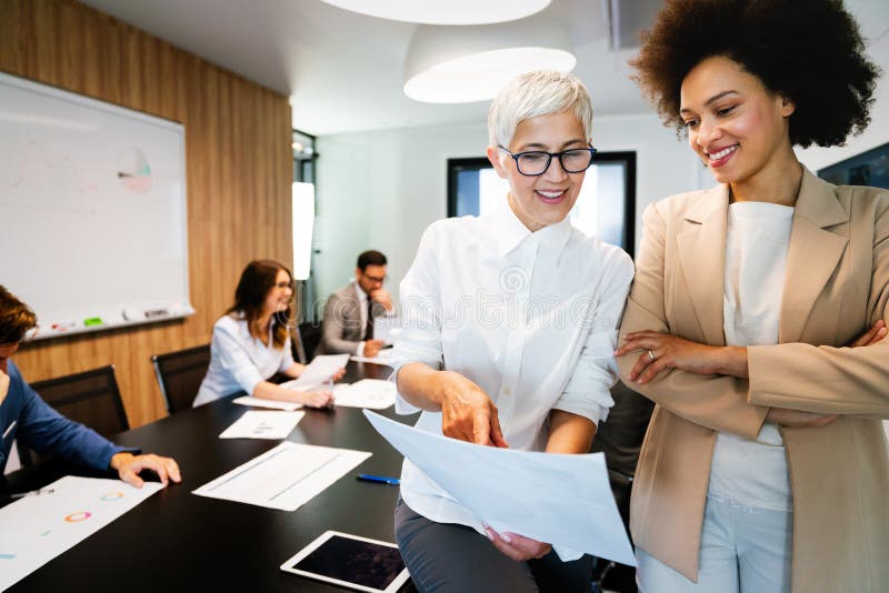 Group of Multiethnic Business People Working at Busy Modern Office ...