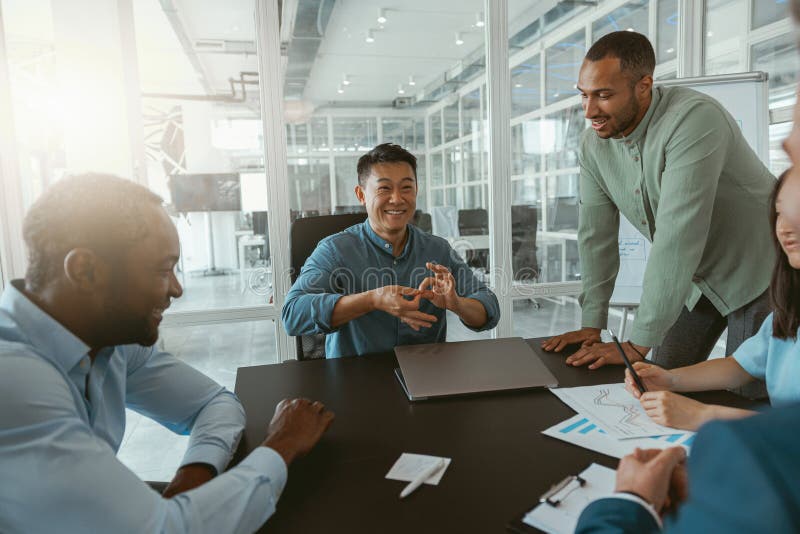 Group of Multiethnic Business People Working Together on Project while ...