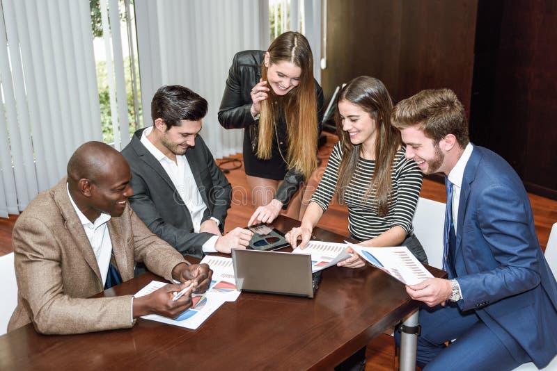 Group of Multiethnic Busy People Working in an Office Stock Photo ...