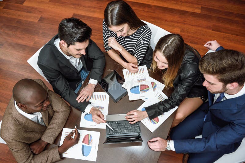 Group of Multiethnic Busy People Working in an Office Stock Photo ...