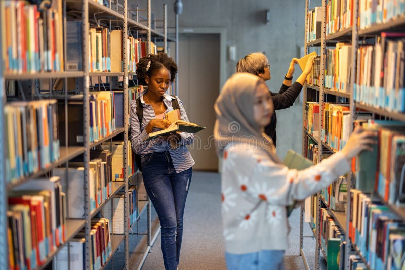 Group of Multiethnic Students in a Library Stock Image - Image of ...