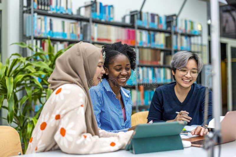 Group of Multiethnic Students in a Library Stock Photo - Image of ...