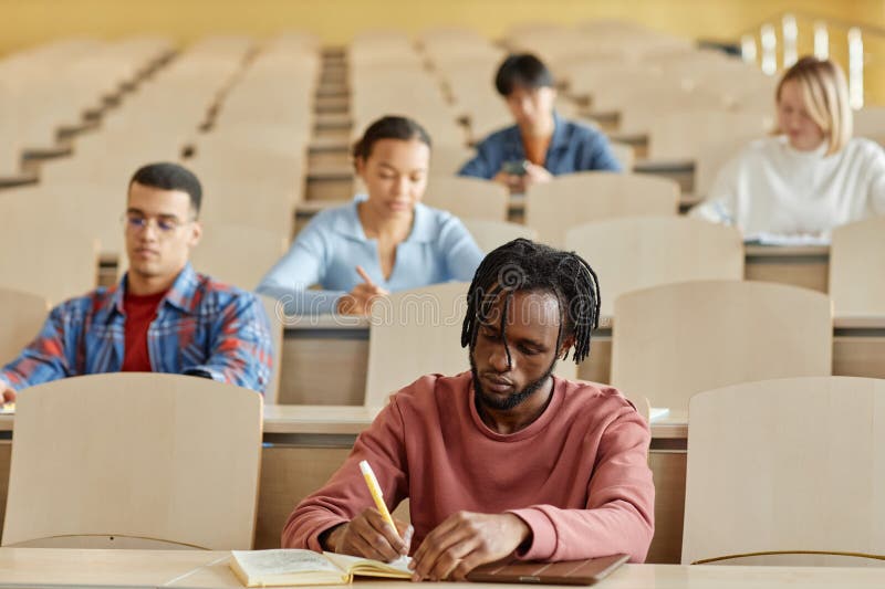 Group of Multiethnic Students Sitting at Lecture Stock Photo - Image of ...
