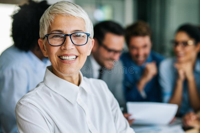 Group of Multiethnic Successful Business People Working and ...