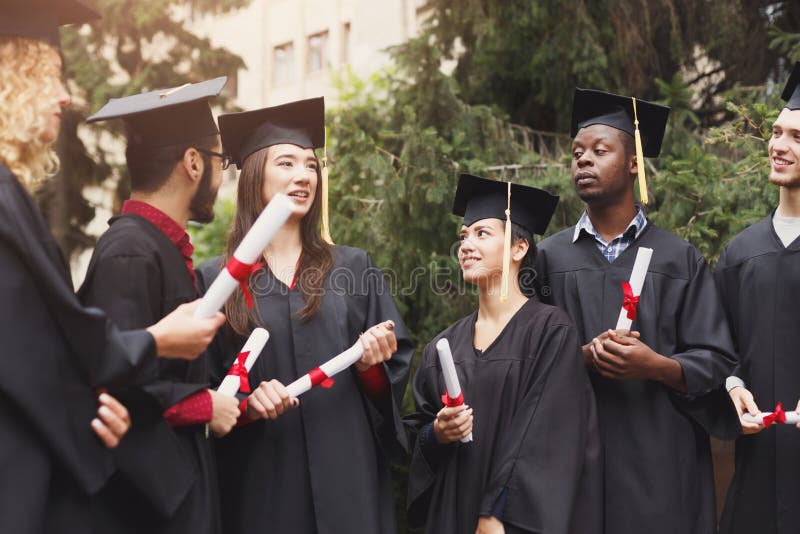 A Group of Graduates Celebrating Stock Image - Image of class ...