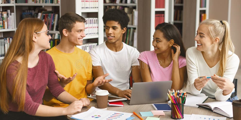 Group of Multinational Teenagers Working on Project at Library Stock ...