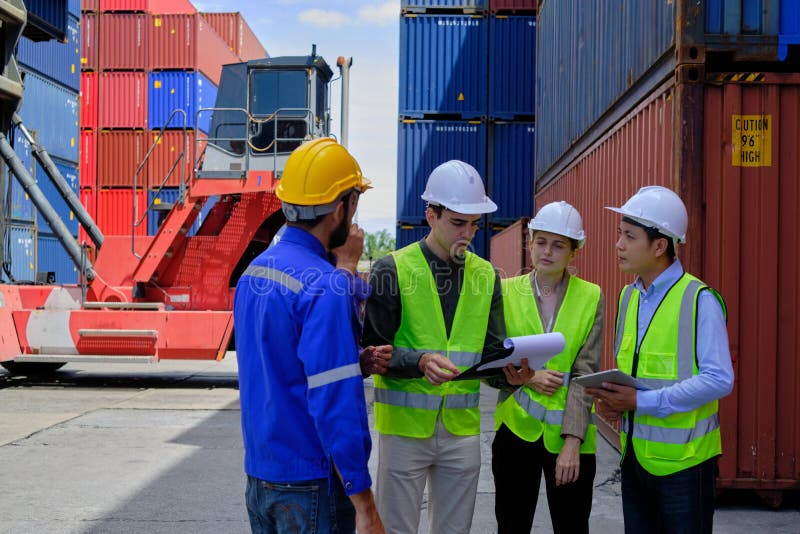 Group of Workers Teamwork at Logistics Terminal with Many Stacks of ...