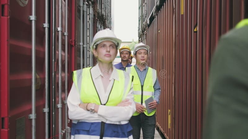 The Multiracial Workers Inspect Shipping Cargo at Nook of the Container ...