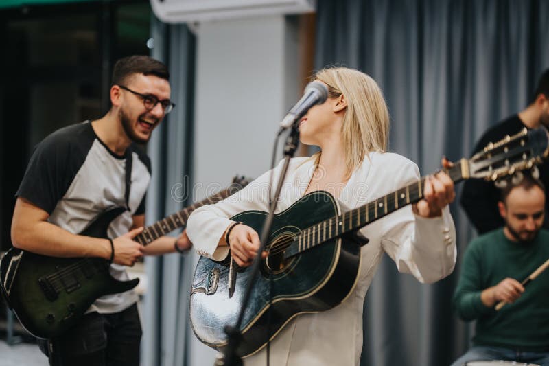Group of Musicians Practicing Music Together in a Professional Studio ...