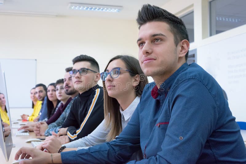 Group of Muttiethnic it Students Working at Their Computer Lab. Group ...