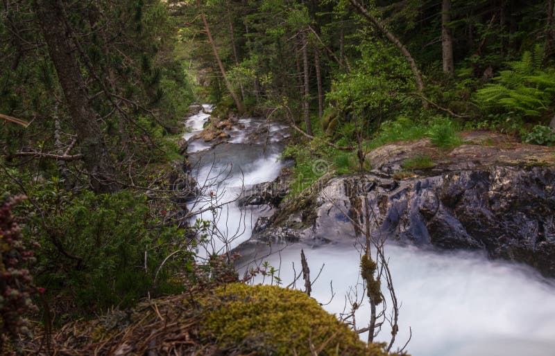 Group of Natural Waterfalls Channel the Water Falling from the Mountain ...