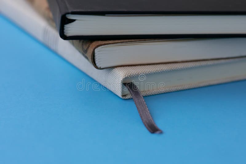 Group of Notebooks on Blue Background. Stock Image - Image of work ...