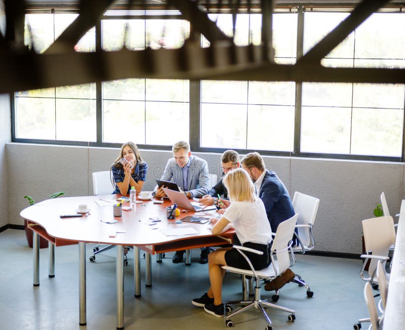 A Group of Office Workers Work at the Desk in the Office Stock Image ...