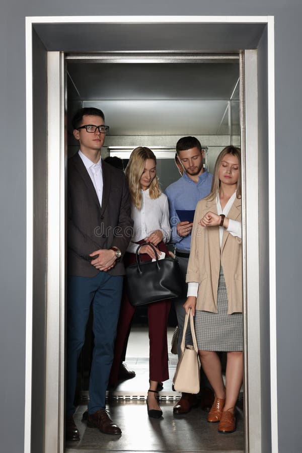 Group of Office Workers in Modern Elevator Stock Photo - Image of ...