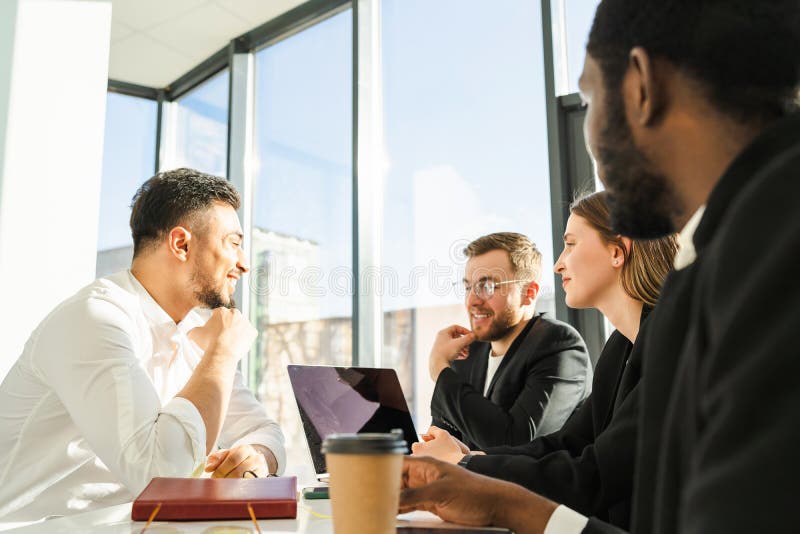 Group of Office Workers Holding a Meeting. Stock Photo - Image of ...