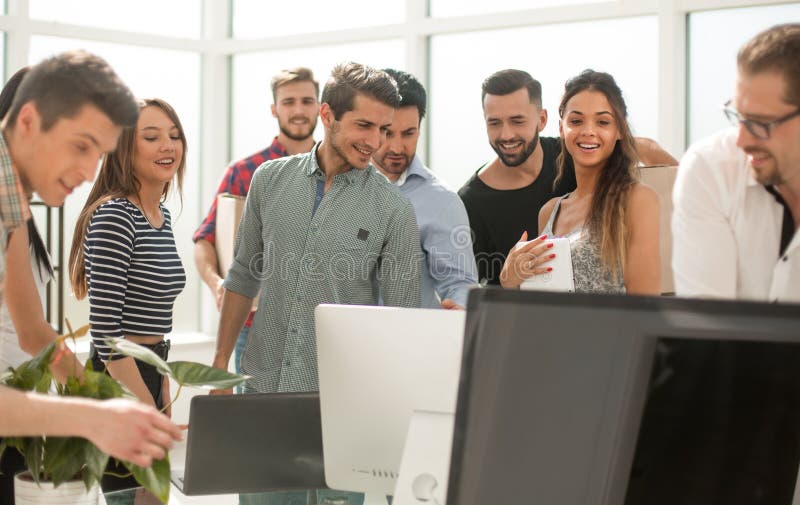 Group of Office Workers Looking at New Computers Stock Photo - Image of ...