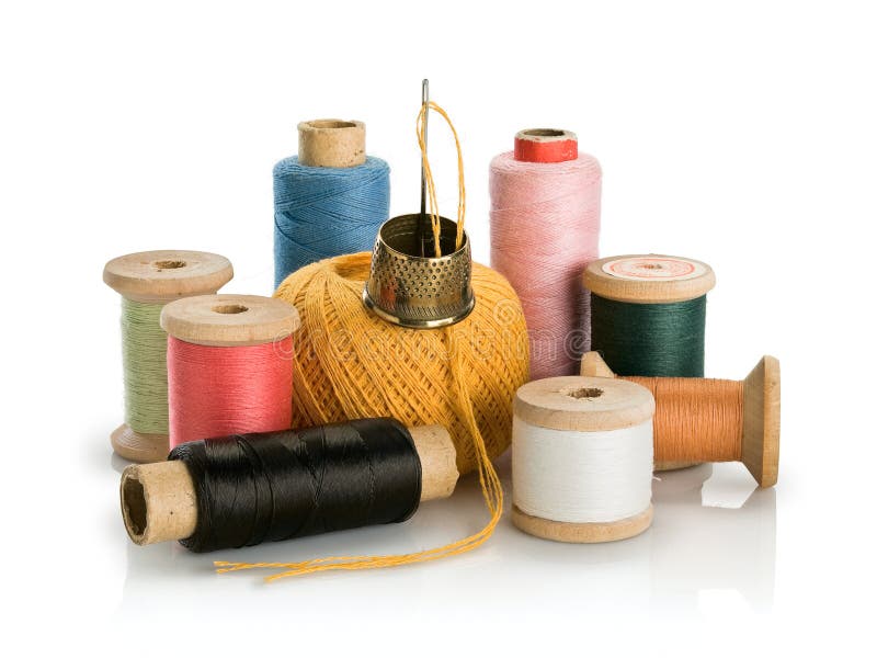 Group of Old Coils with Multi-colored Threads and Needle with Thimble ...