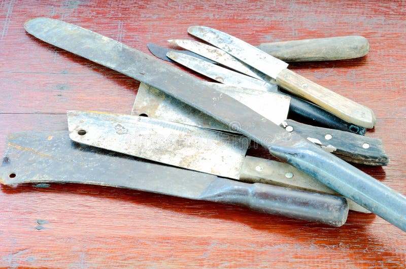 A Group of an Old Knife with Wooden Handle Used To Be Used in the ...