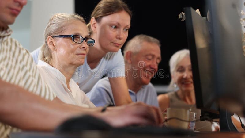 Group of Older People Studying on Computer Course Stock Video - Video ...
