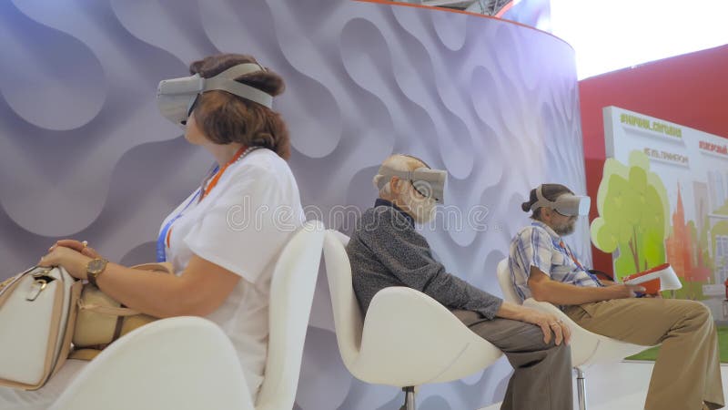 Group of Older People Using Virtual Reality Headset at VR Technology ...