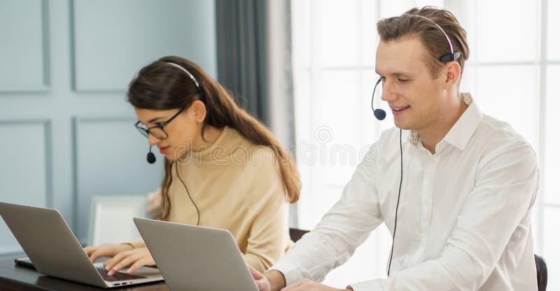 Group of Operator Man and Woman Working with Headset and Laptop ...