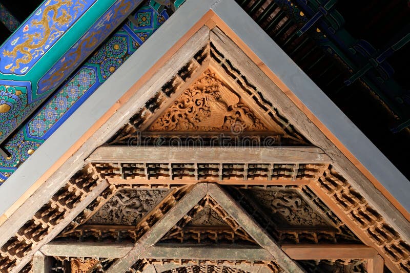 A Group of Ornately Decorated Columns in the Shape of a Pyramid ...