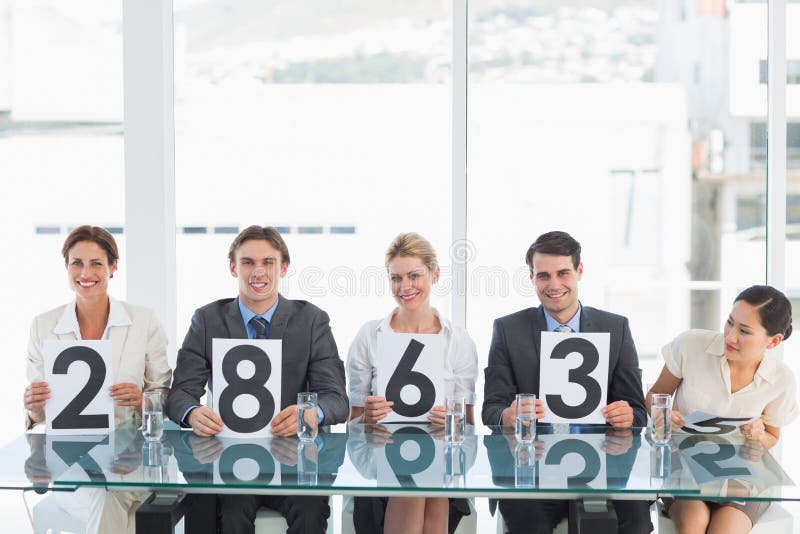 Group of Panel Judges Holding Score Signs Stock Photo - Image of copy ...