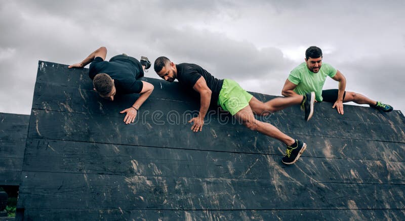 Participants in Obstacle Course Climbing Wall Stock Image - Image of ...