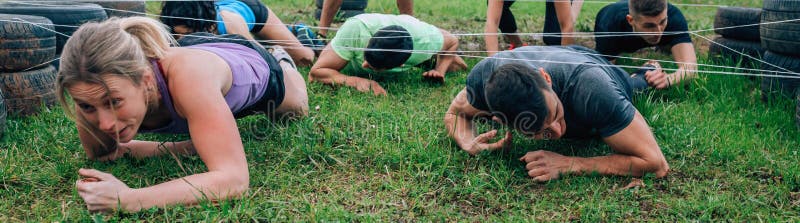 Participants in an Obstacle Course Crawling Stock Image - Image of ...