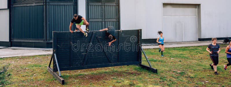 Participants Obstacle Course Going through a Pipe Stock Photo - Image ...