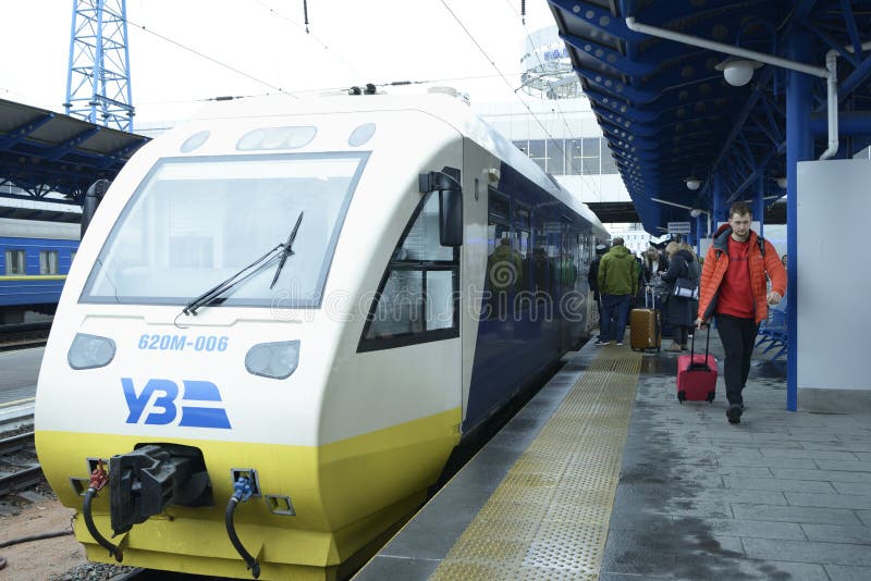 Group of Passengers Standing in Front of Doors of the Passenger Train ...