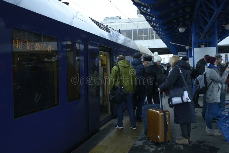 Group of Passengers Standing in Front of Doors of the Passenger Train ...