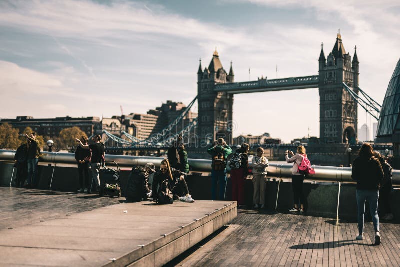 Group of People Admiring the Iconic London Tower Bridge in England ...