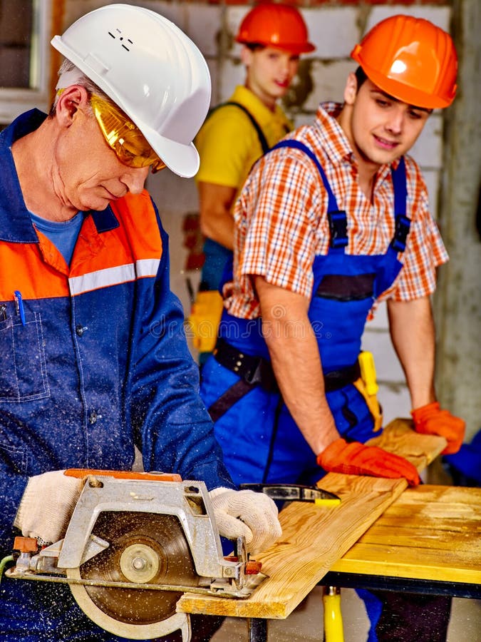 Group People Builder with Circular Saw Stock Photo - Image of ...