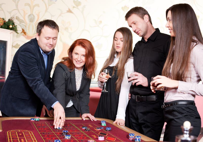 Group of people in casino stock photo. Image of casino - 18088372