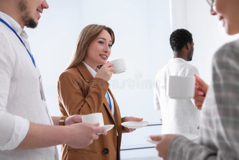 Group of People Chatting during Coffee Break Stock Photo - Image of ...