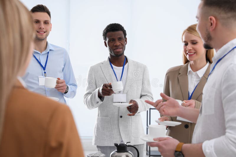 Group of People Chatting during Coffee Break Indoors Stock Image ...