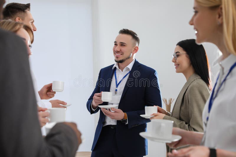 Group of People Chatting during Coffee Break Stock Photo - Image of ...