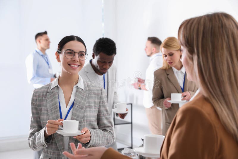Group of People Chatting during Coffee Break Stock Photo - Image of ...