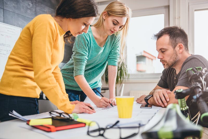 Group of People Checking Blueprints Stock Image - Image of casual ...